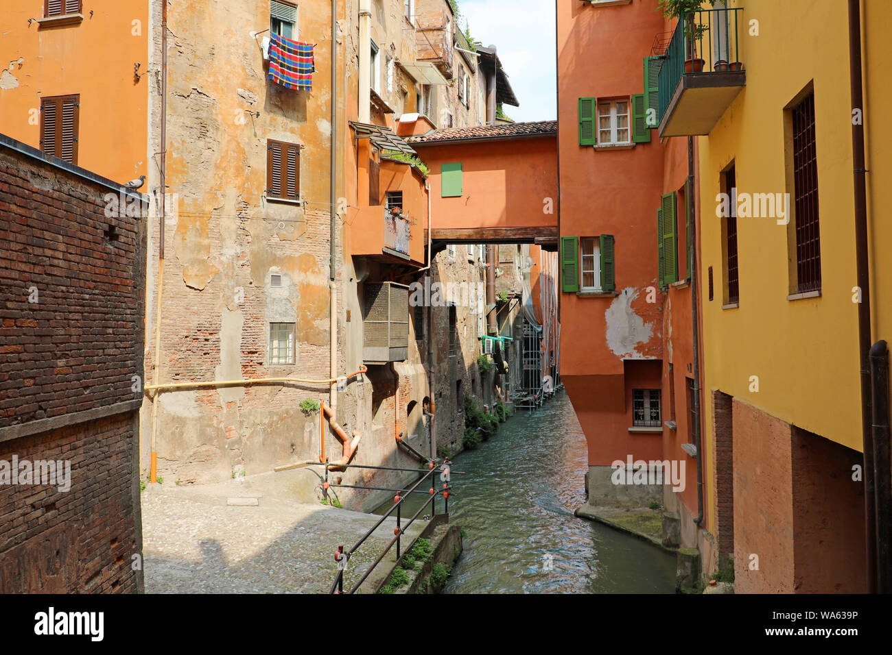 Italian houses between the hidden canal of Reno river, Bologna, Italy ...