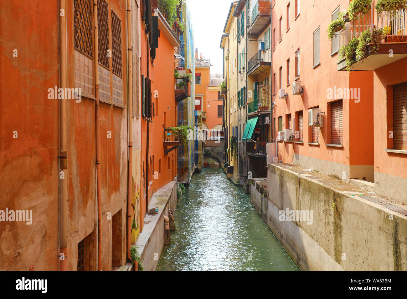 Italian houses between the hidden canal of Reno river, Bologna, Italy ...
