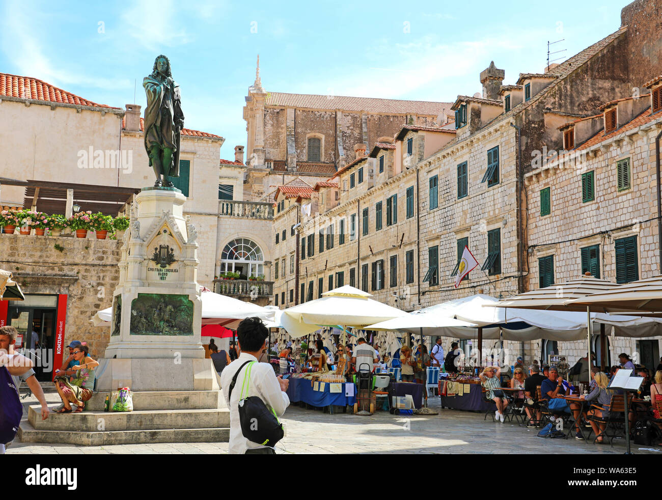 DUBROVNIK, CROATIA - JULY 11,2019: Main Gundulic Square with sculpture ...