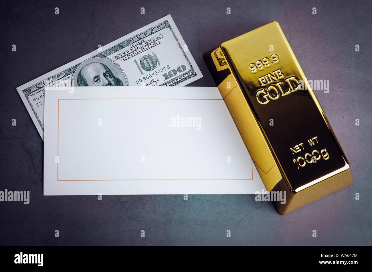 Gold bar ingot bullion dollar bill and greeting card Stock Photo - Alamy