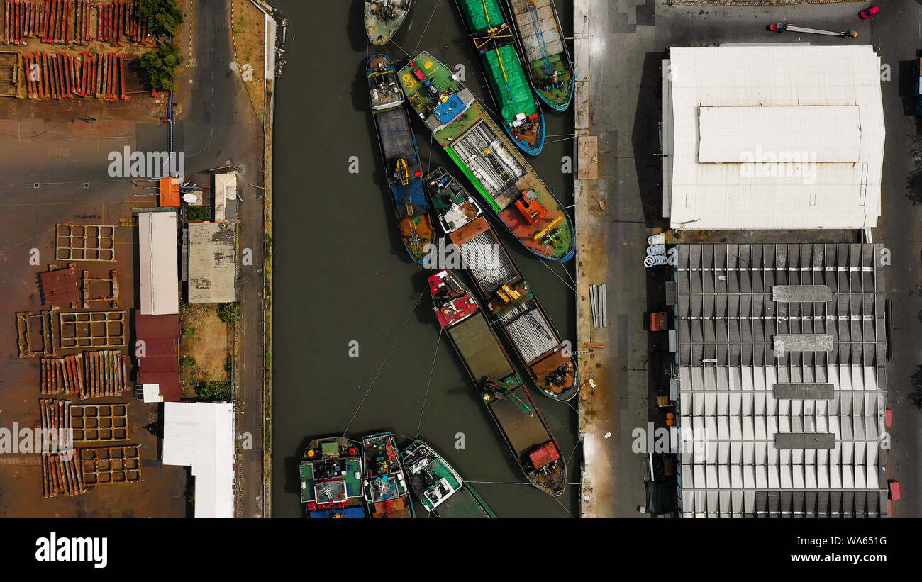 aerial view cargo and passenger seaport with ships and crane Tanjung ...