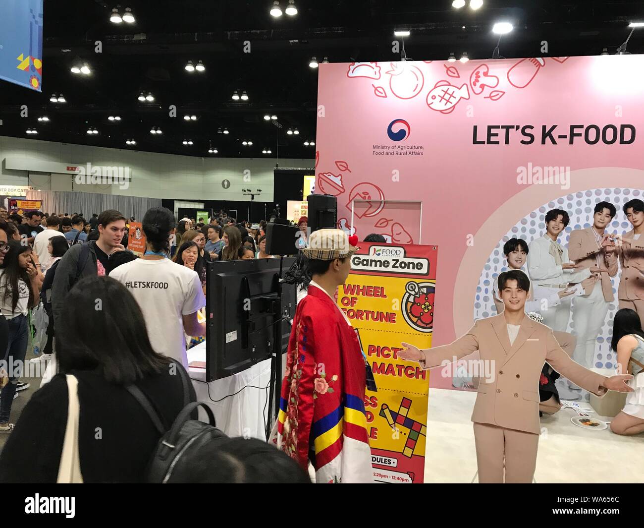 Korean food fair in LA Visitors try Korean food at a K-food fair held ...