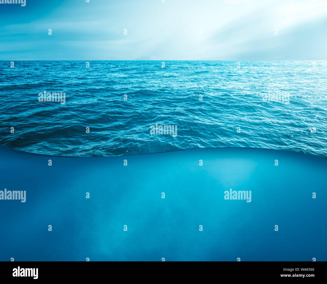 wavy sea water surface with sky and underwater Stock Photo - Alamy