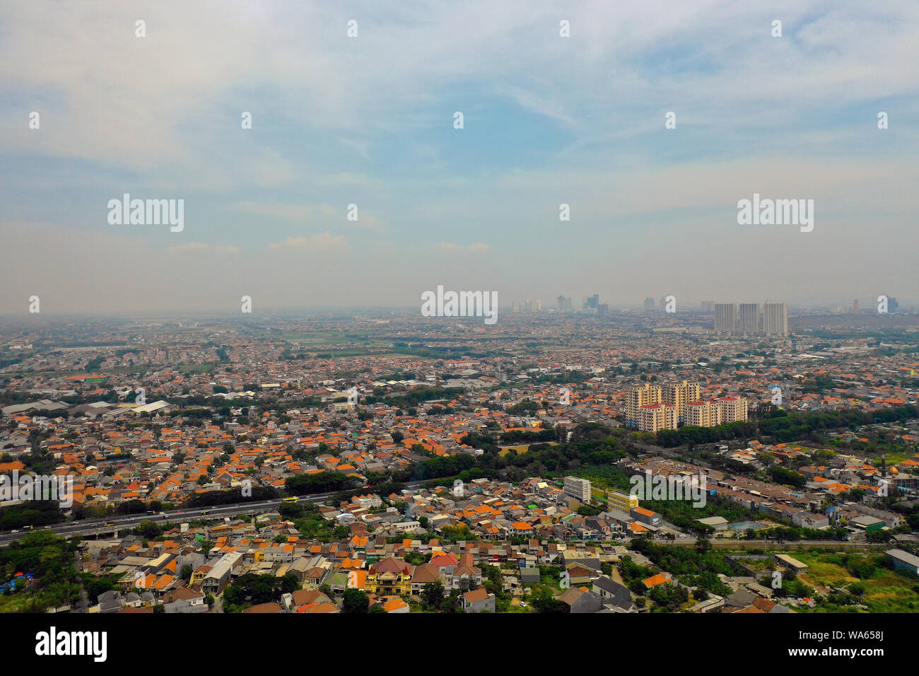 Aerial cityscape modern city Surabaya with skyscrapers, buildings and ...