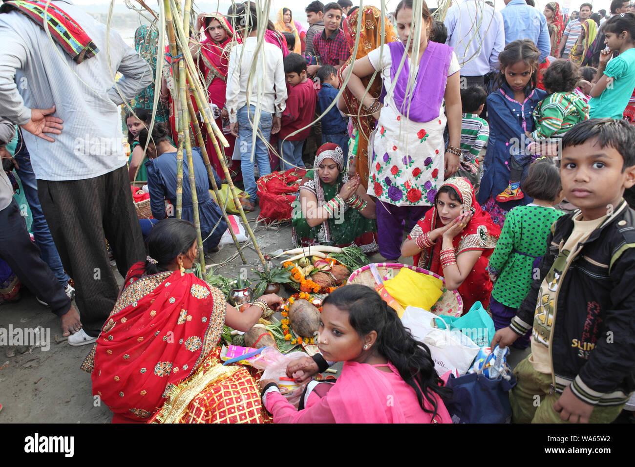 Group of people celebrating chhath puja festival at ghat Stock Photo ...