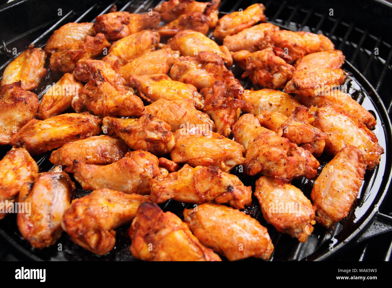 Chicken wings on the grill Stock Photo - Alamy