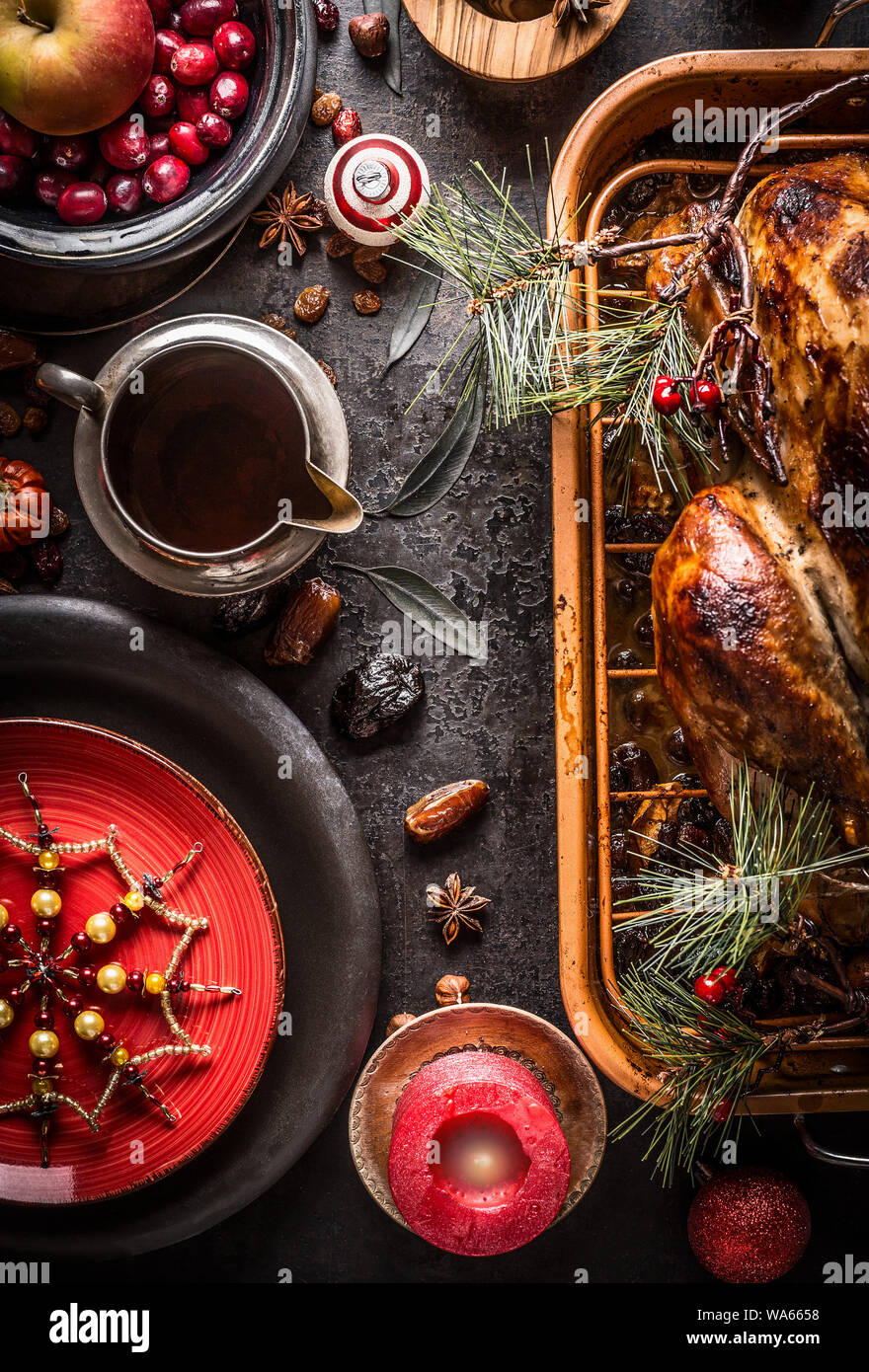 Christmas dinner. Festive table setting with roasted turkey served with ...