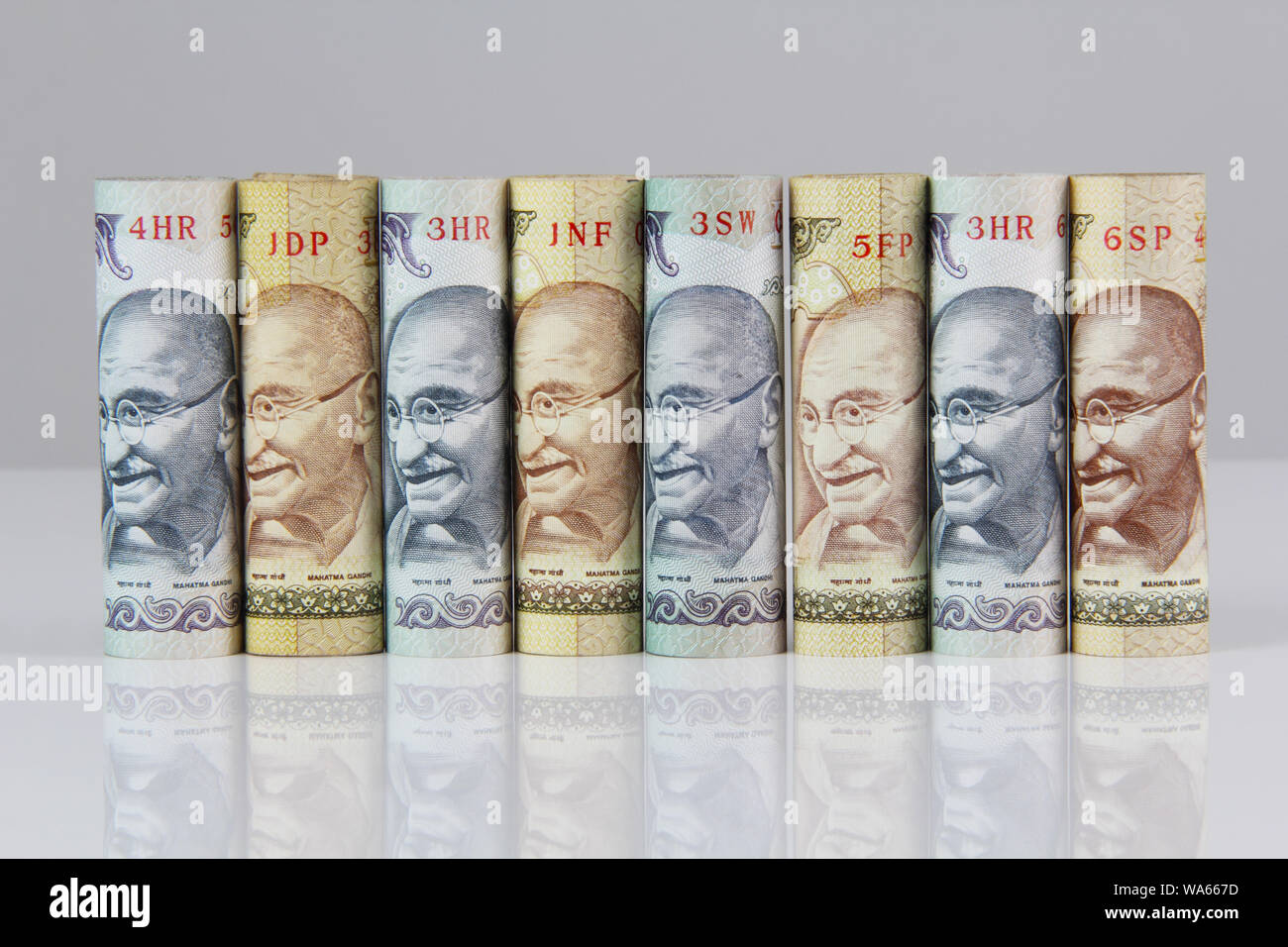 Close up rolling banknotes hi-res stock photography and images - Alamy