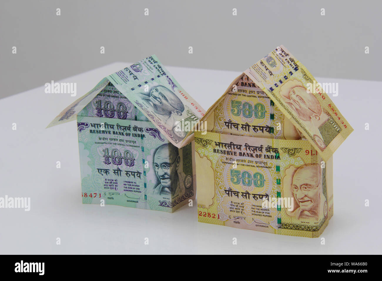 Model home made of Indian paper currency Stock Photo - Alamy