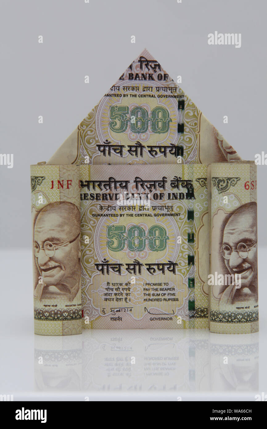 Model home made of five hundred rupee notes Stock Photo - Alamy