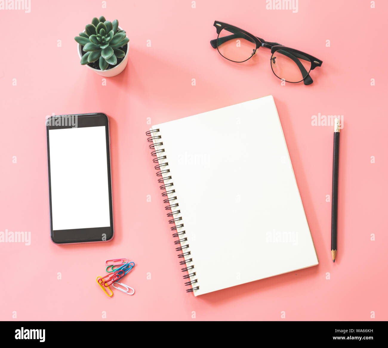 Flat lay mockup design of workspace desk with blank notebook ...