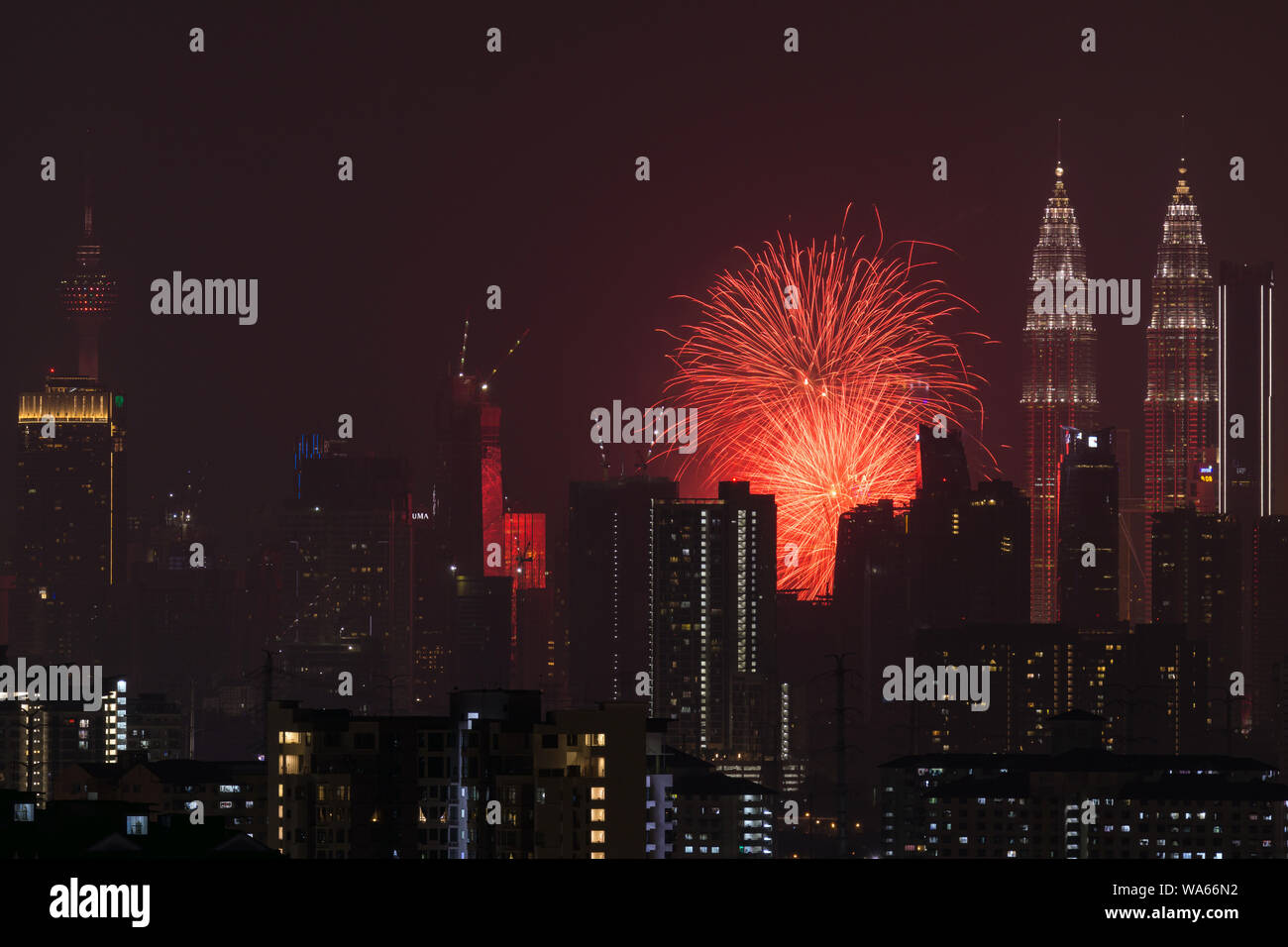 Fireworks explode over the Petronas Twin Towers during the midnight ...