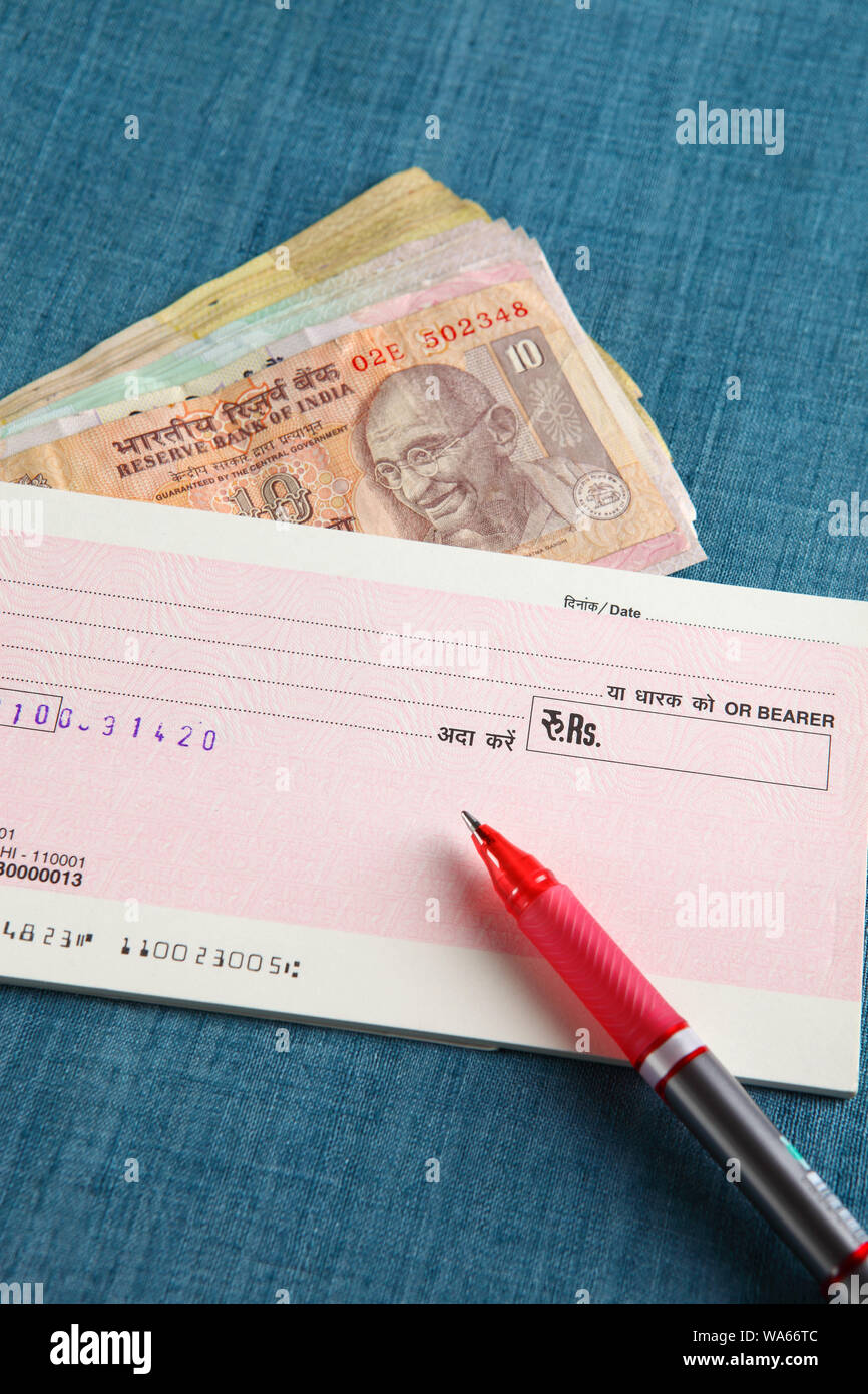 Cheques cheque finance money hi-res stock photography and images - Alamy