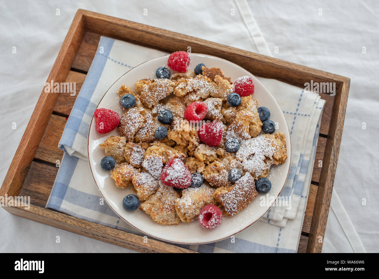 Kaiserschmarrn - traditional austrian pancake dessert with fresh fruit ...
