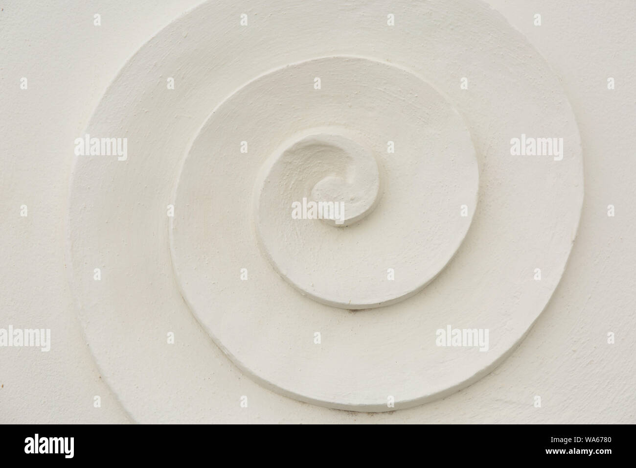 White plaster spiral. Macro background Stock Photo - Alamy