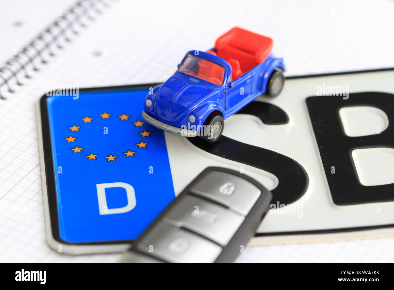 License plate with a car key Stock Photo - Alamy