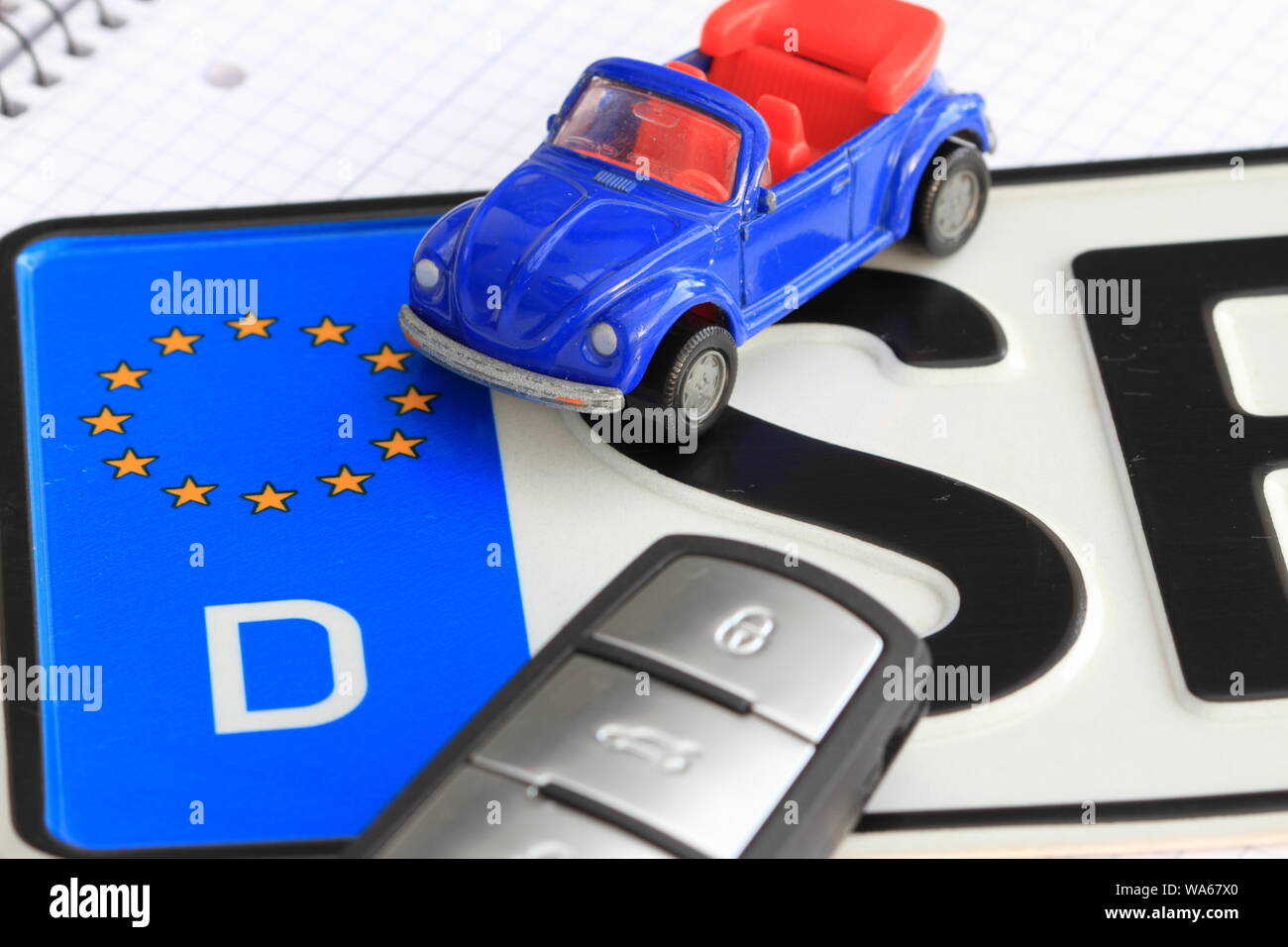 License plate with a car key Stock Photo - Alamy