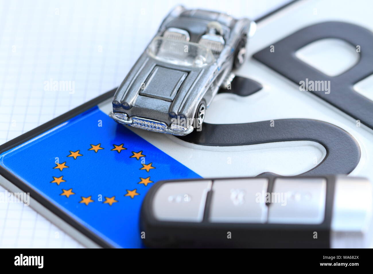 License plate with a car key Stock Photo - Alamy
