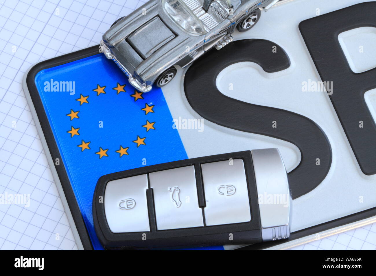 License plate with a car key Stock Photo - Alamy