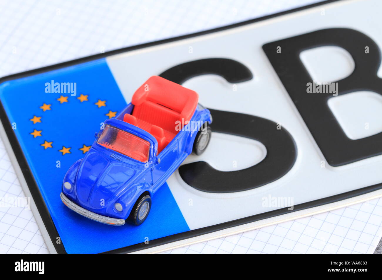 License plate with a car key Stock Photo - Alamy