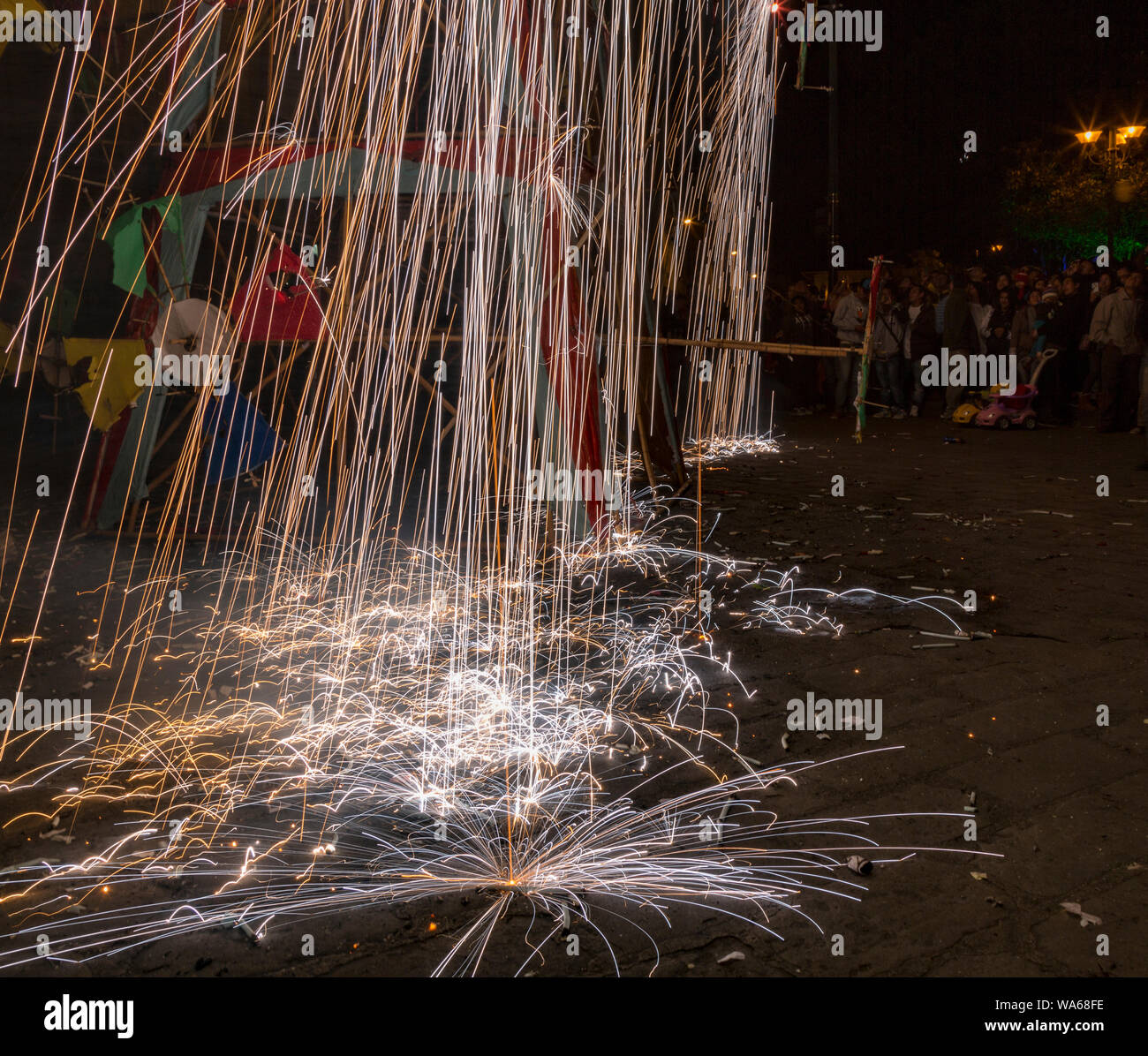 Castles are made with bamboo structures, fire cracker strings, many ...