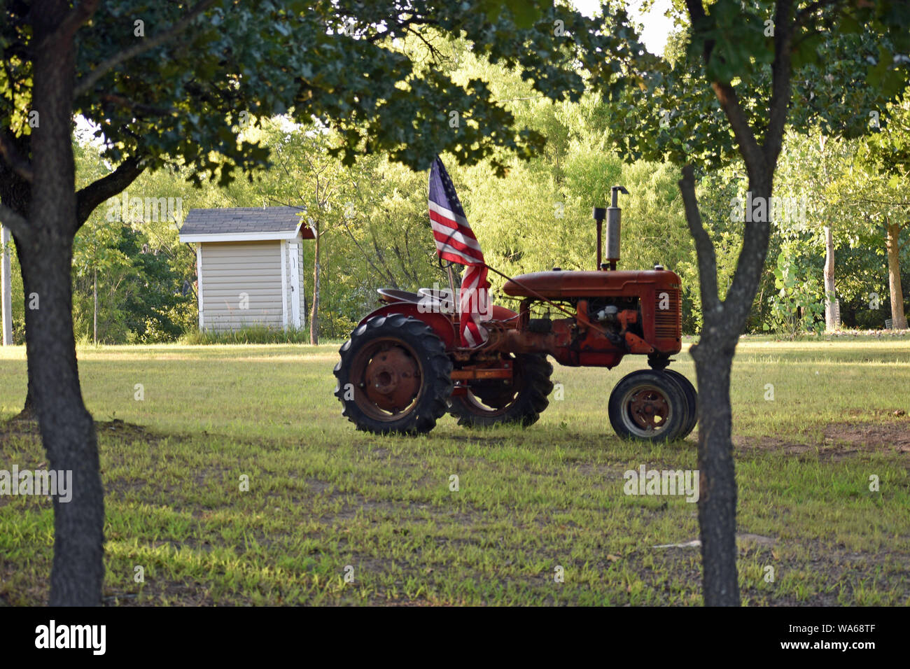 Tractor with American Flag Stock Photo - Alamy