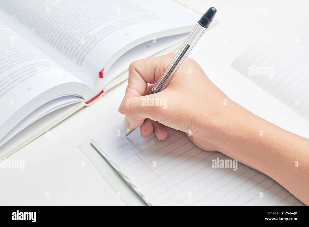 Young schoolgirl doing homework in hi-res stock photography and images ...