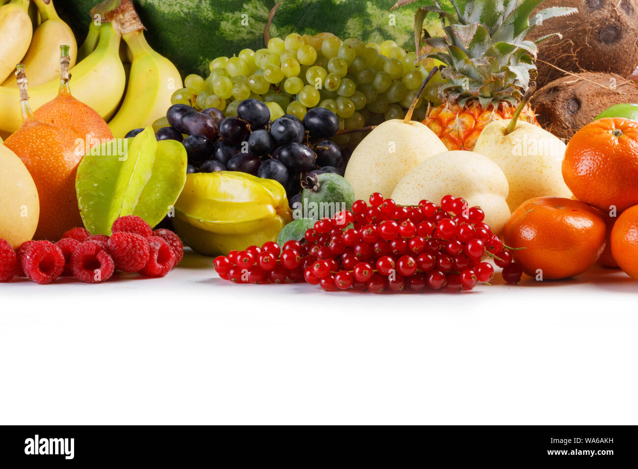 Fresh tropical fruits harvest pile isolated on white background with ...