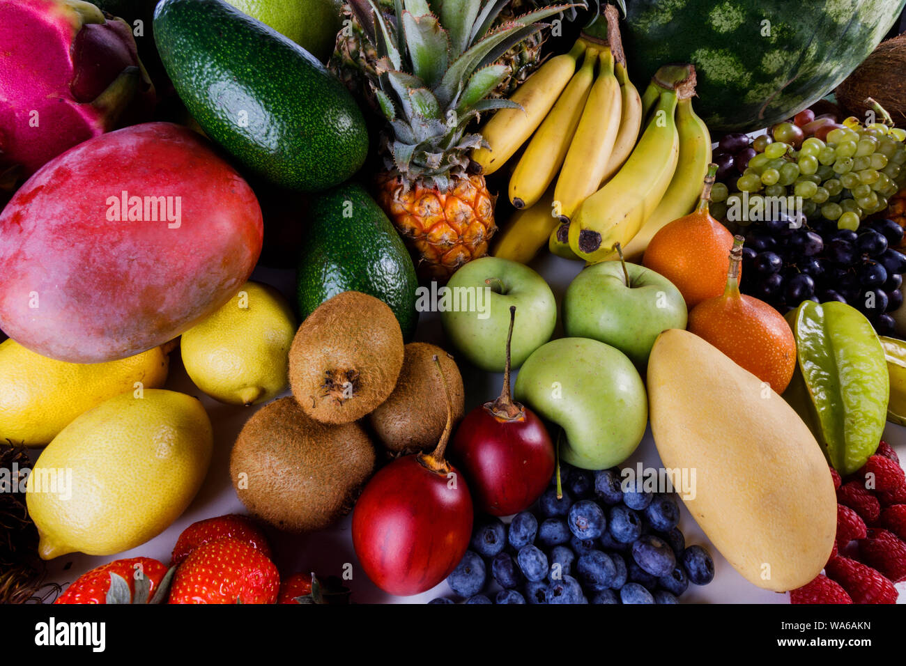 Assorted background of many tropical colorful fruits harvest Stock ...