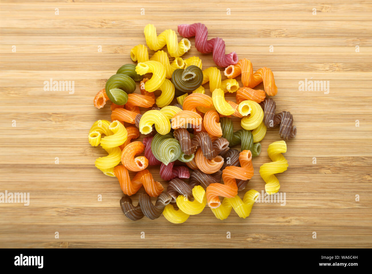 Italian colorful pasta scattered on the table. space for text. top view ...