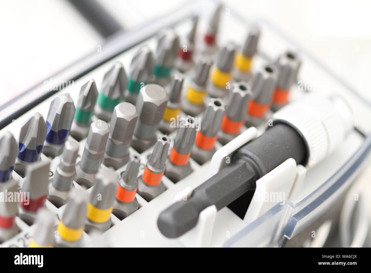 different colored bits for the cordless screwdriver Stock Photo - Alamy