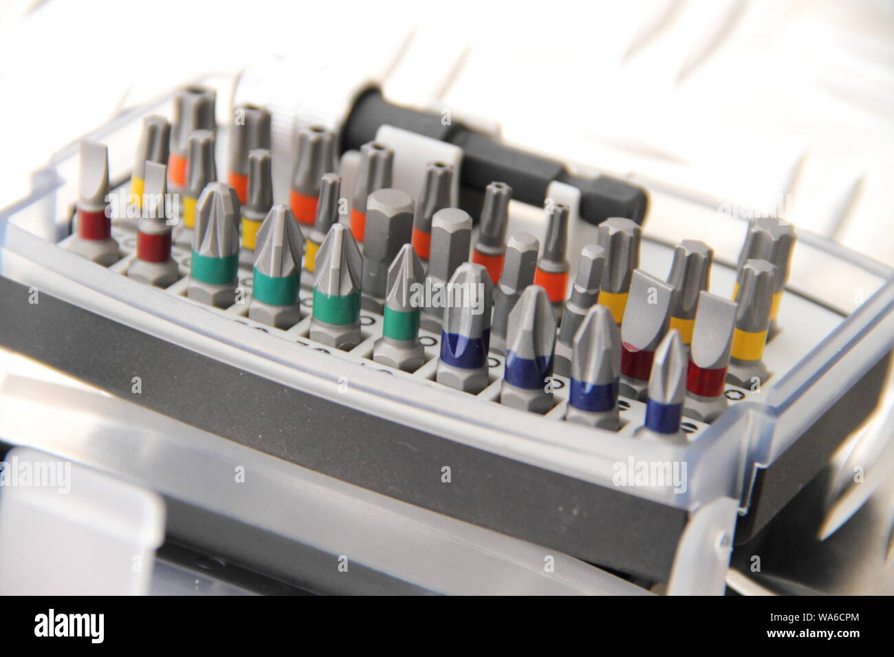 different colored bits for the cordless screwdriver Stock Photo - Alamy