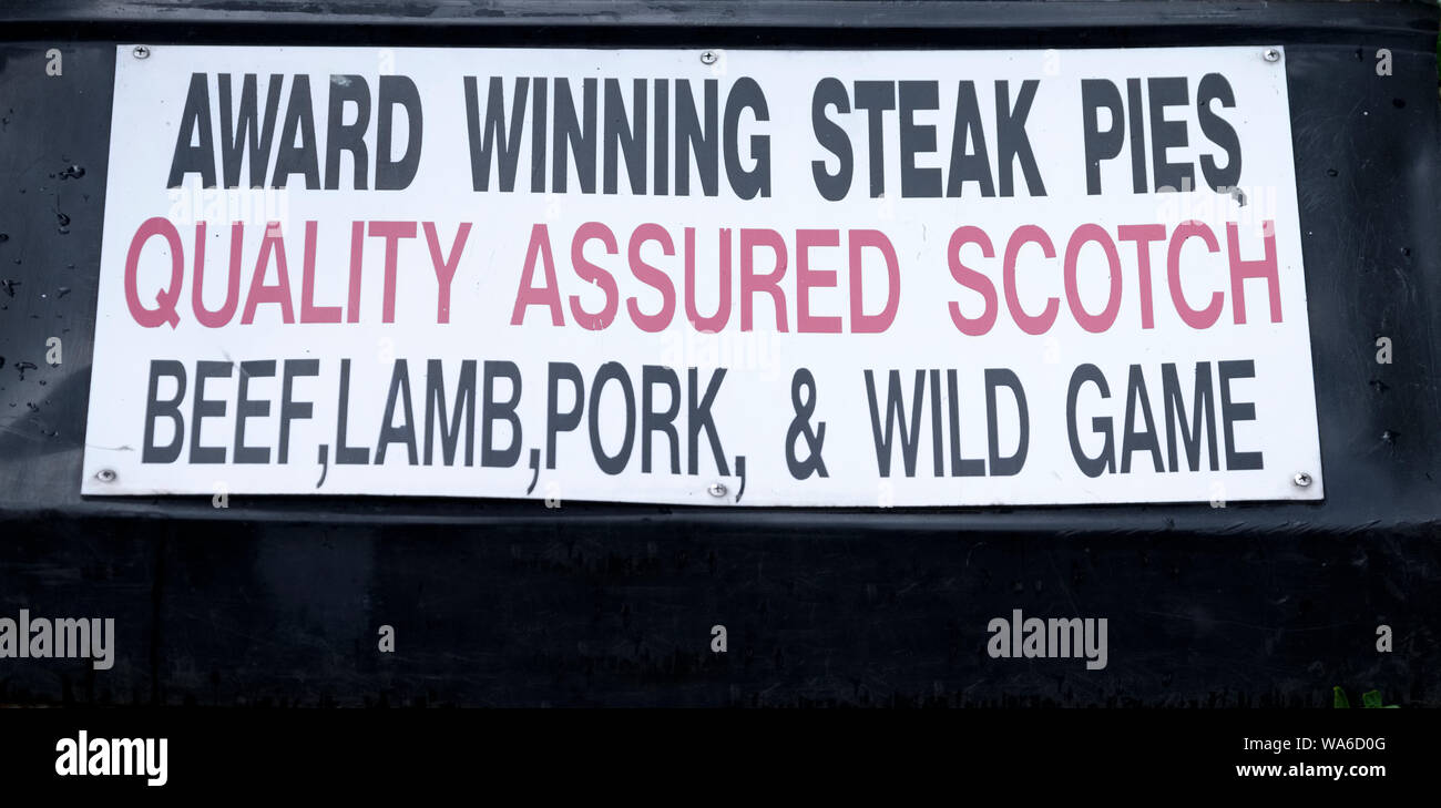 Award winning gourmet steak wild game pies butcher food sign Stock ...