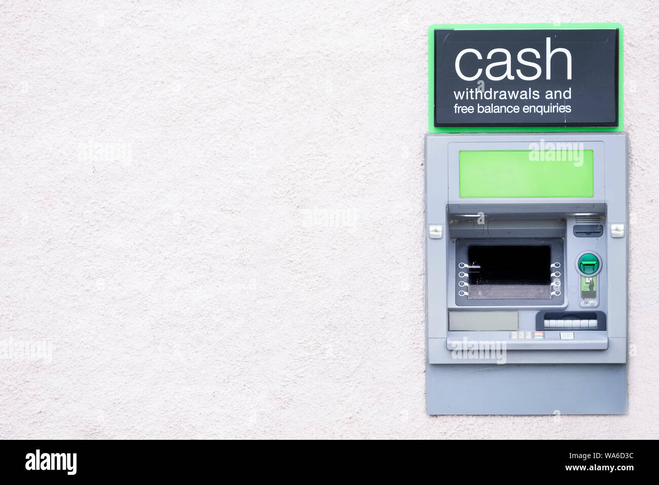 Cash point machine ATM automated free withdrawal in wall Stock Photo ...