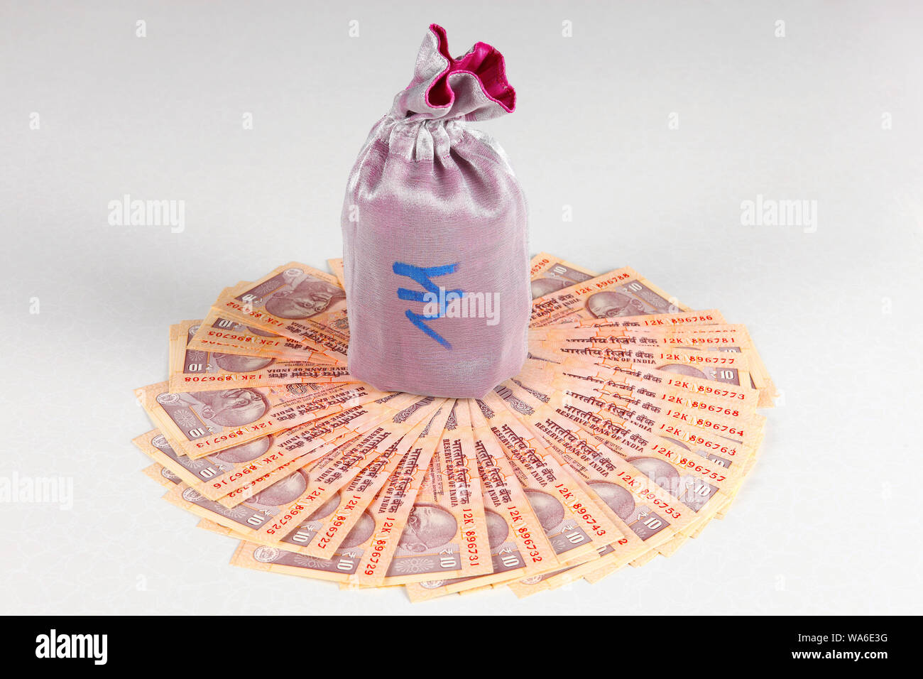 Money bag with Indian currency Stock Photo - Alamy