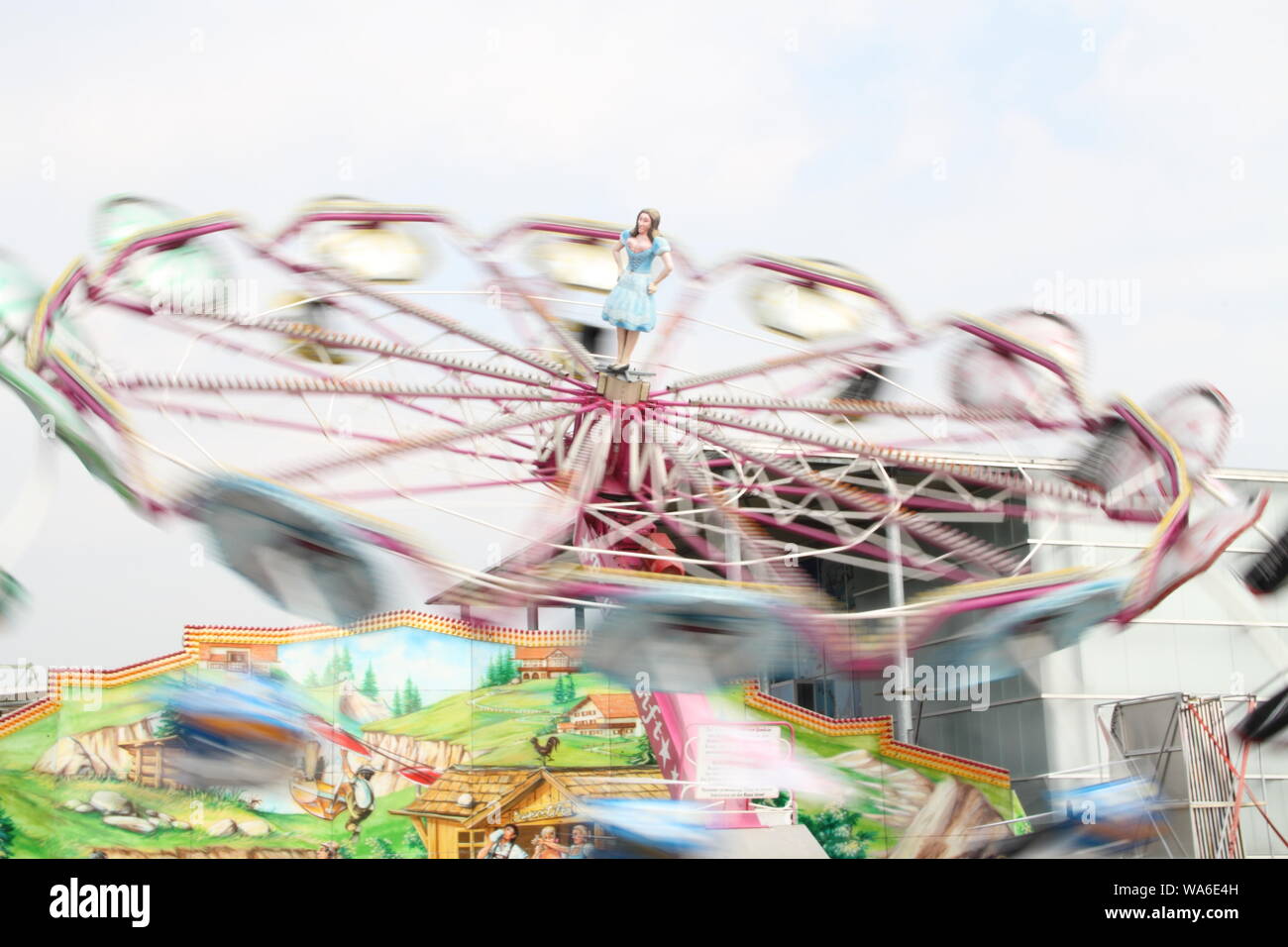 a chain carousel at the funfair Stock Photo - Alamy