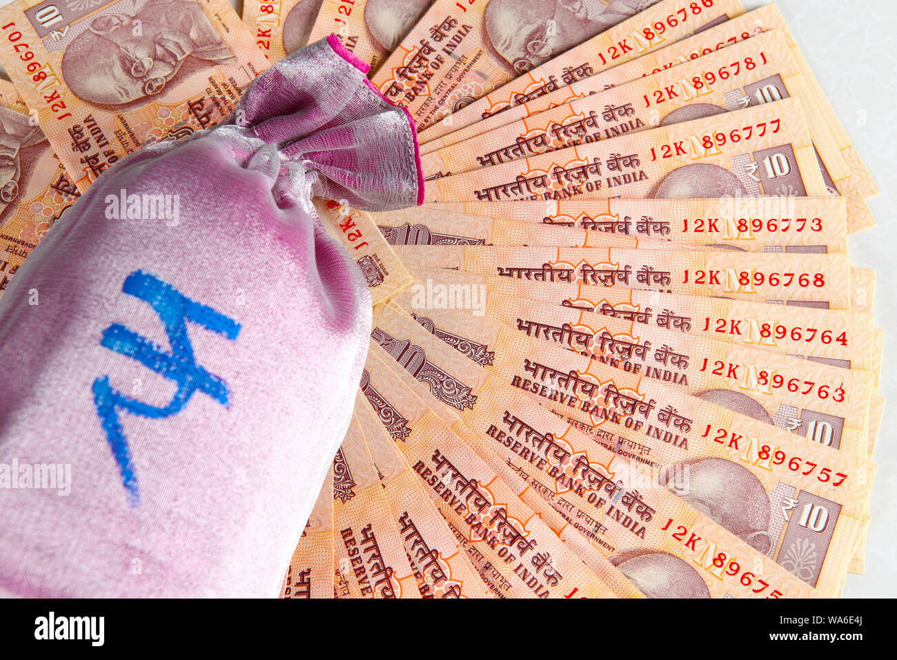 Money bag with Indian currency Stock Photo - Alamy