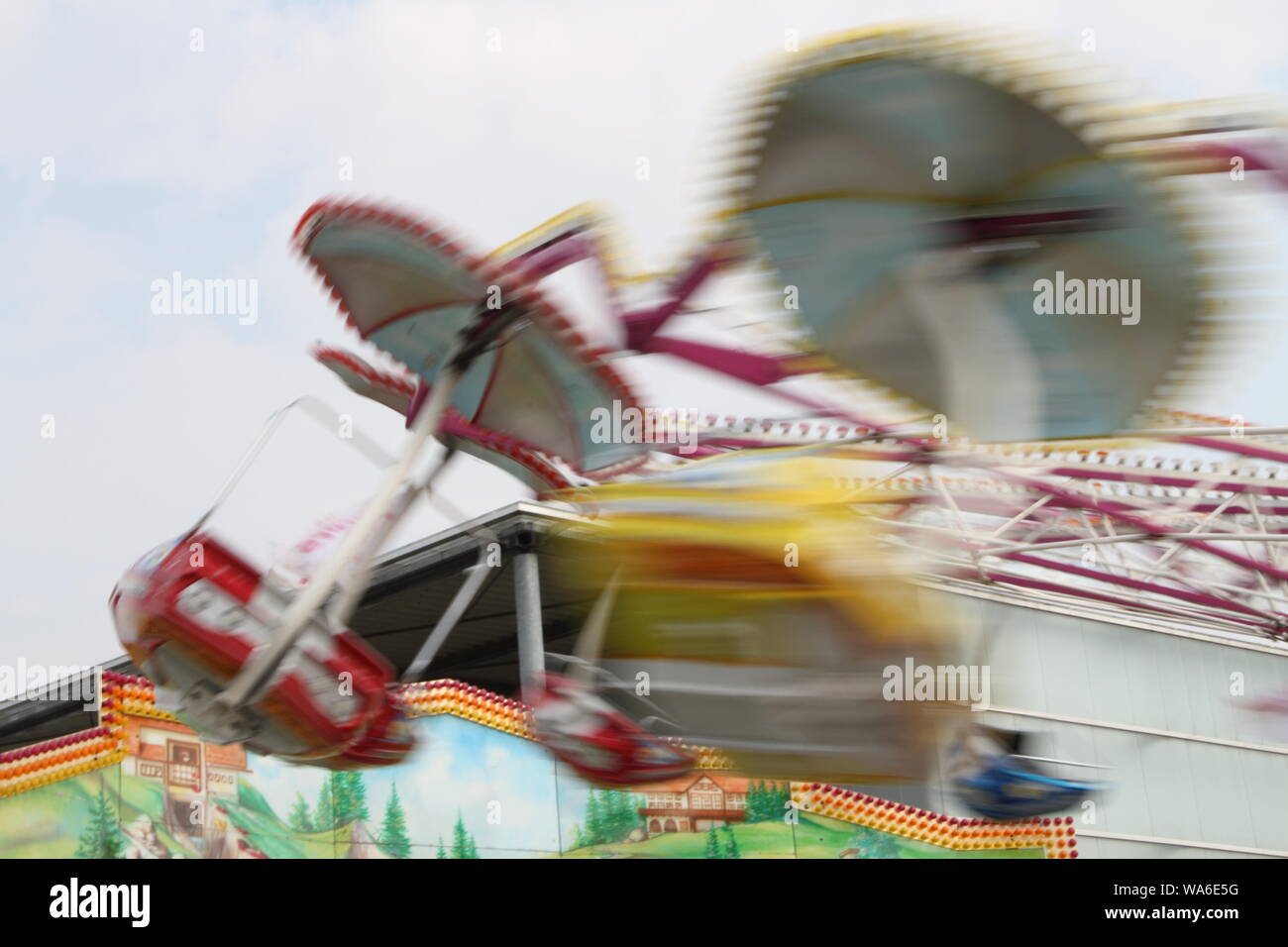 a chain carousel at the funfair Stock Photo - Alamy