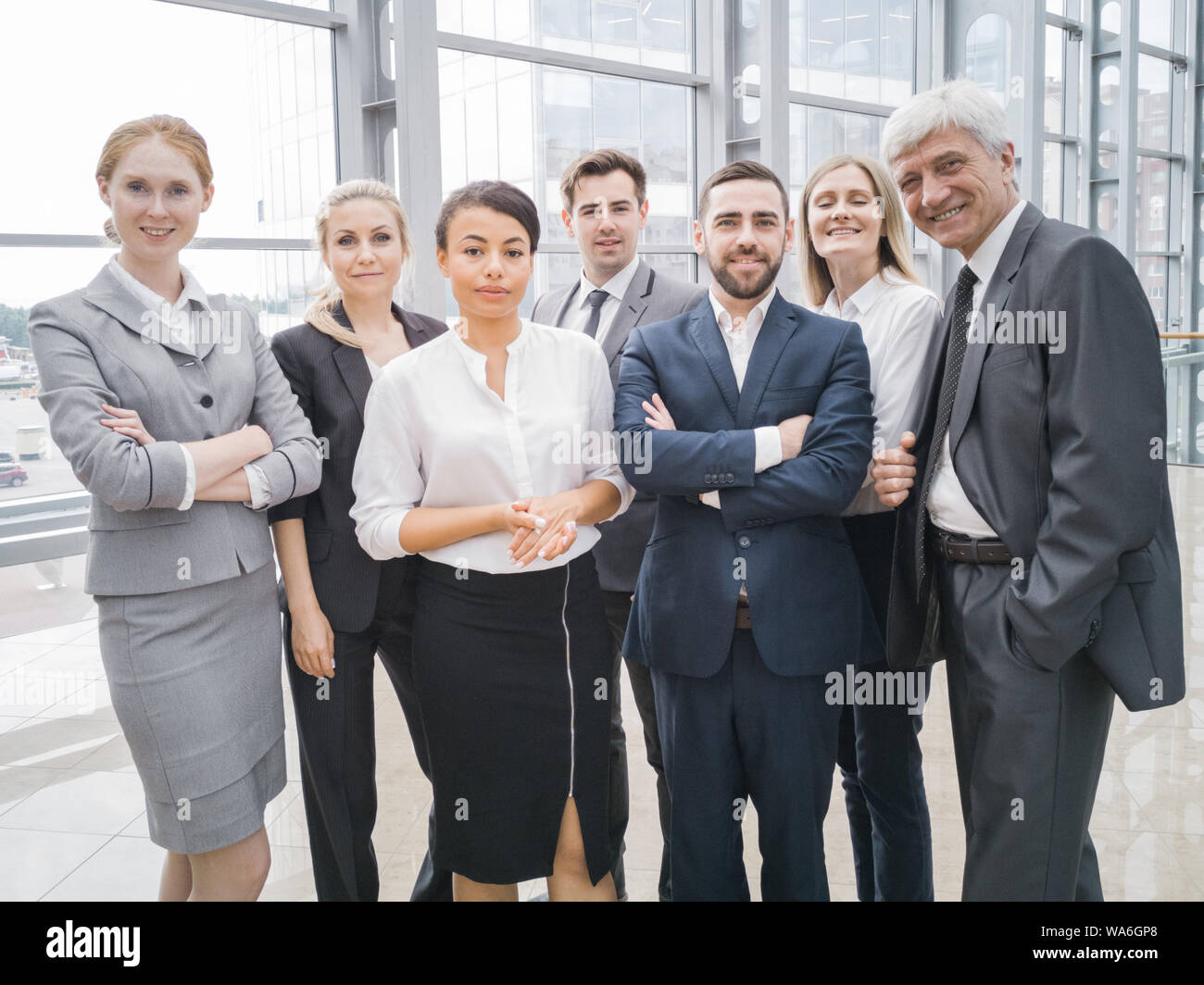Portrait business people team , office staff standing in lobby Stock ...