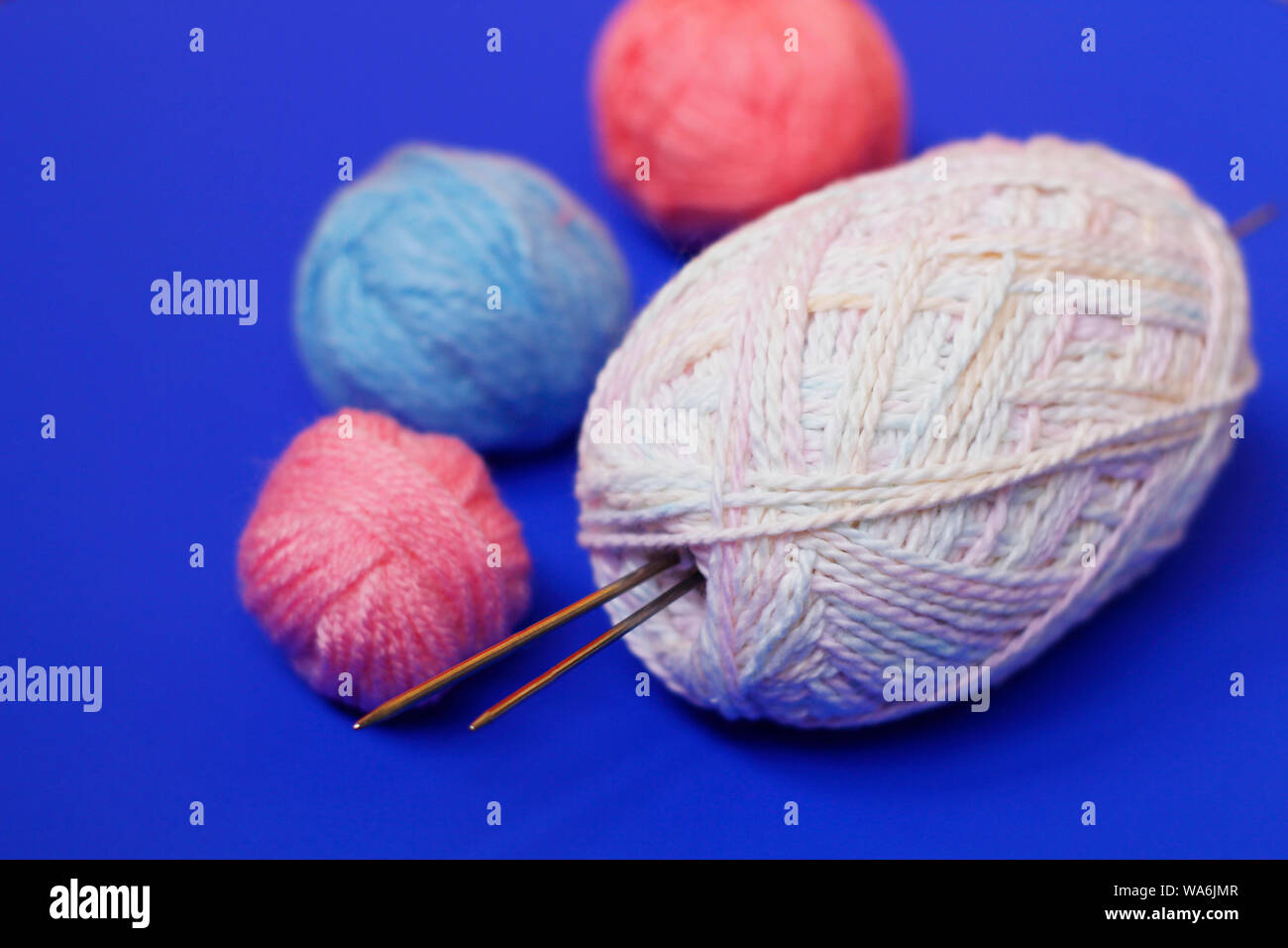 Woolen thread and knitting needle. Accessories for needlework. A ball ...