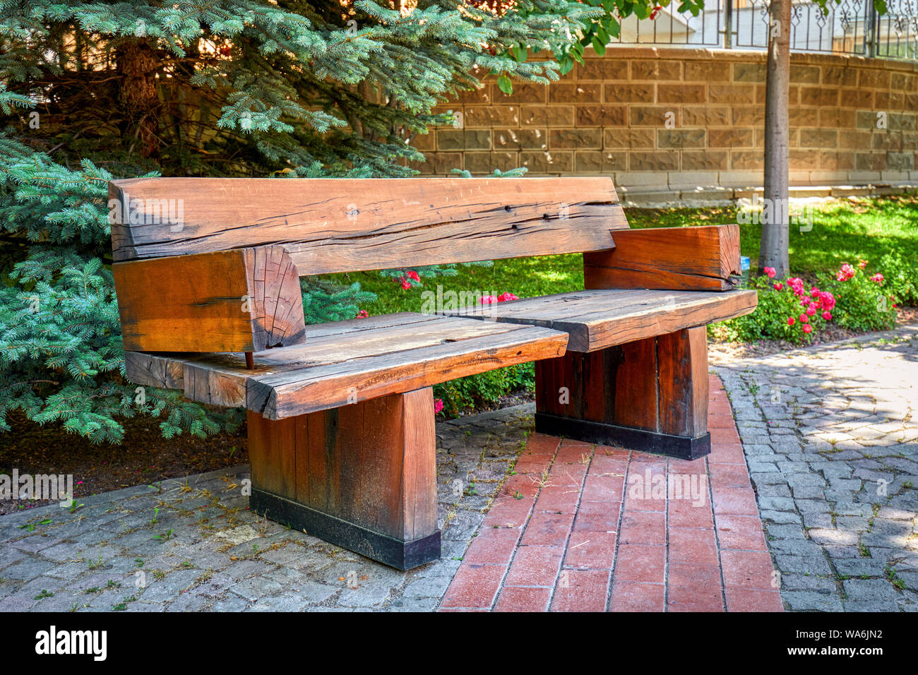 Vintage wooden retro bench at the park. Oak wood Stock Photo - Alamy