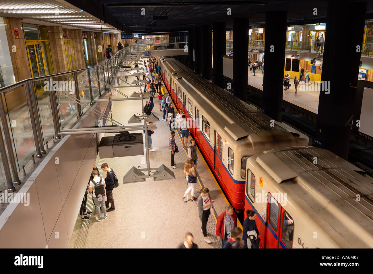 Warsaw, Poland - May 20, 2019: People ready to enter the train at metro ...