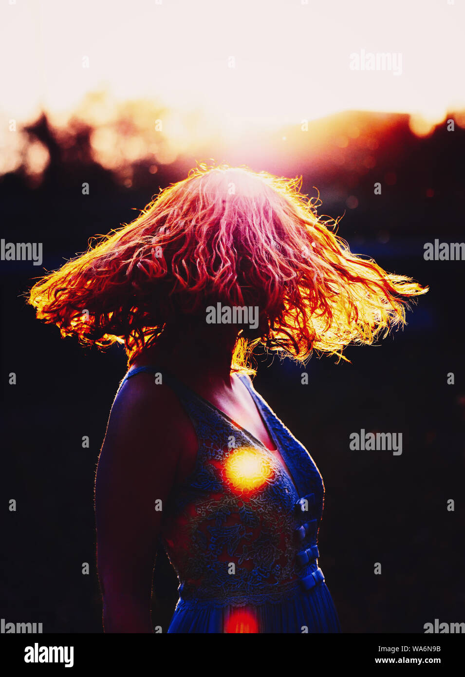 Girl flipping her hair hi-res stock photography and images - Alamy