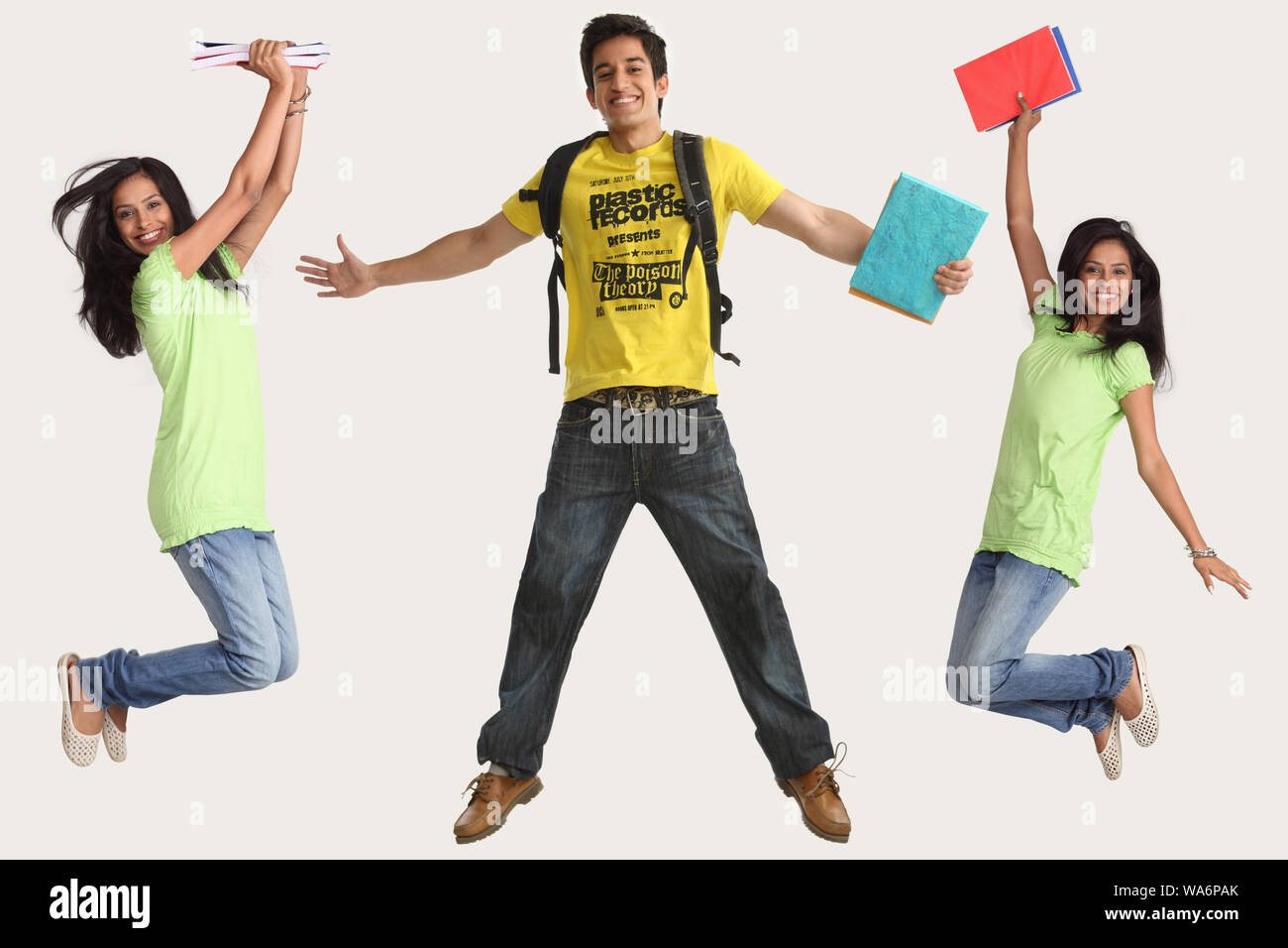 Group of friends jumping in air and smiling Stock Photo - Alamy