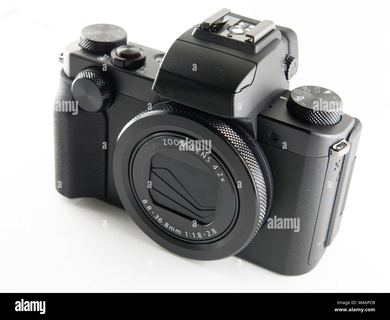 Close up on a modern digital camera isolated on white background Stock ...