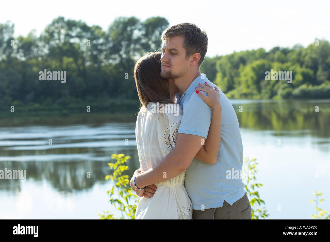 happy romantic couple in love and having fun outdoor in summer day ...
