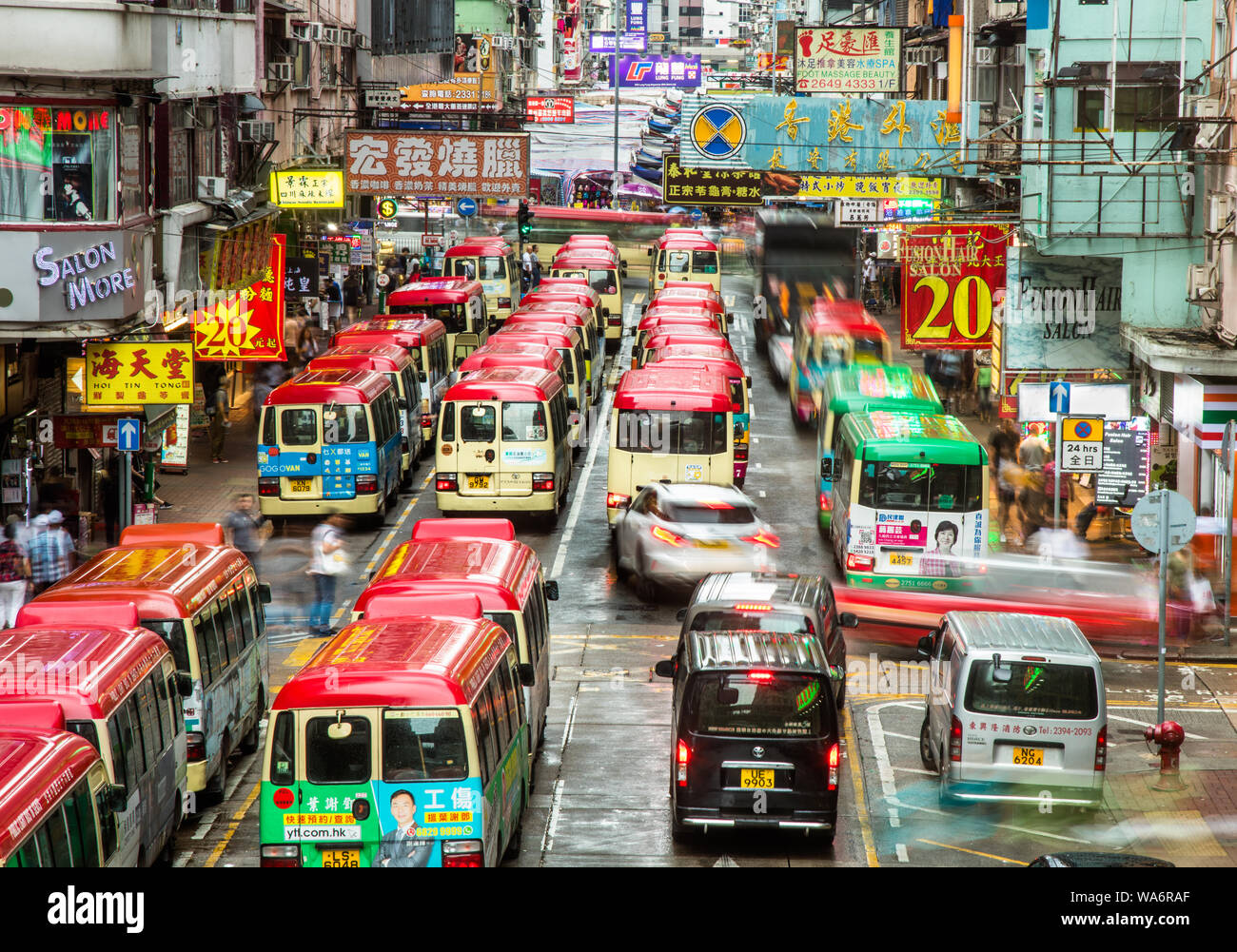 Mini Buses in the busy Mong Kok region of Hong Kong Stock Photo - Alamy