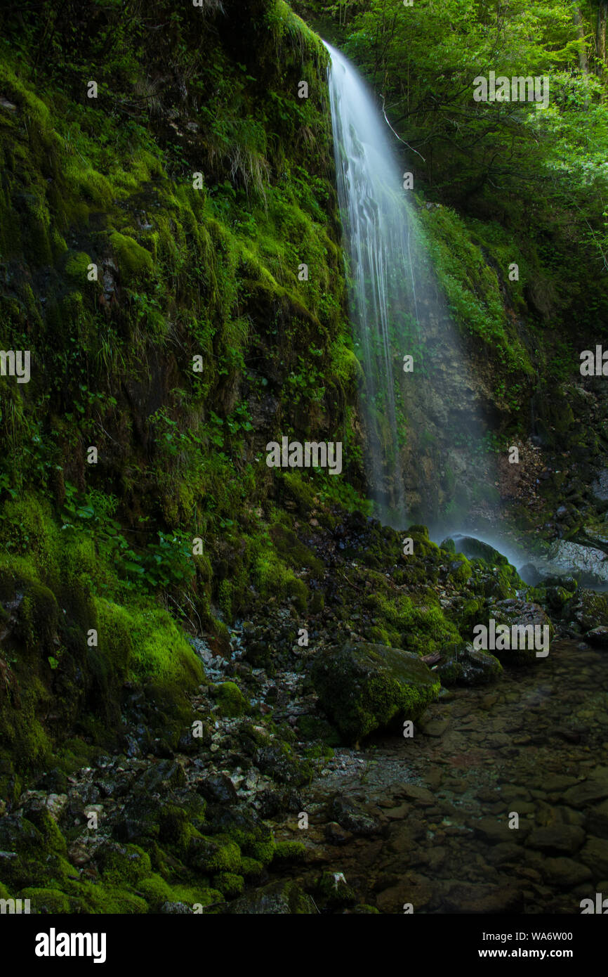 Small waterfall from side Stock Photo - Alamy