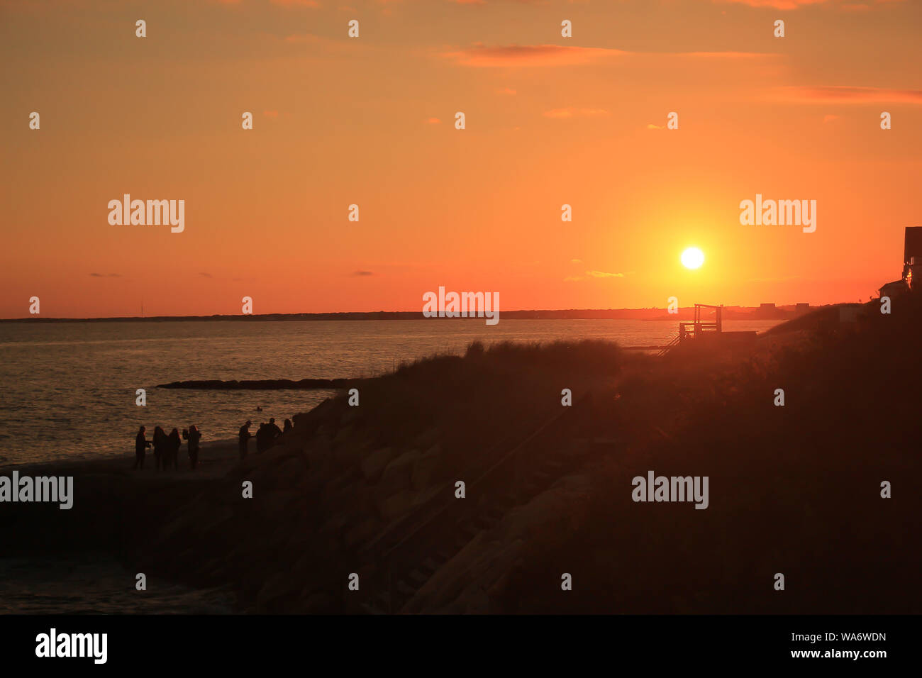 beautiful golden sunset over the atlantic ocean on cape cod Stock Photo ...
