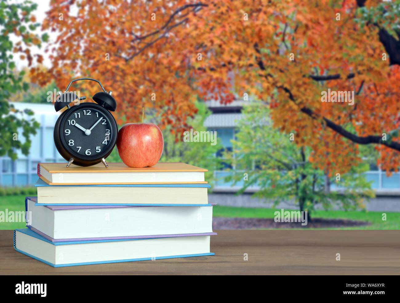 blurry background of university campus in Fall season and book for ...